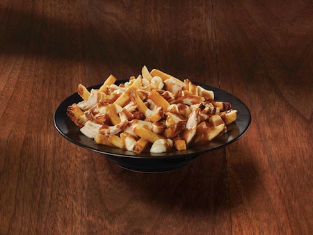 Poutine: A Look at Canadian Cuisine — Michael Parkes Author - Buymeacoffee